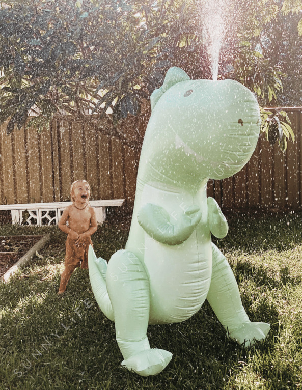 Sunnylife: Inflatable Giant Sprinkler - Surfing Dinosaur | at Mighty Ape NZ